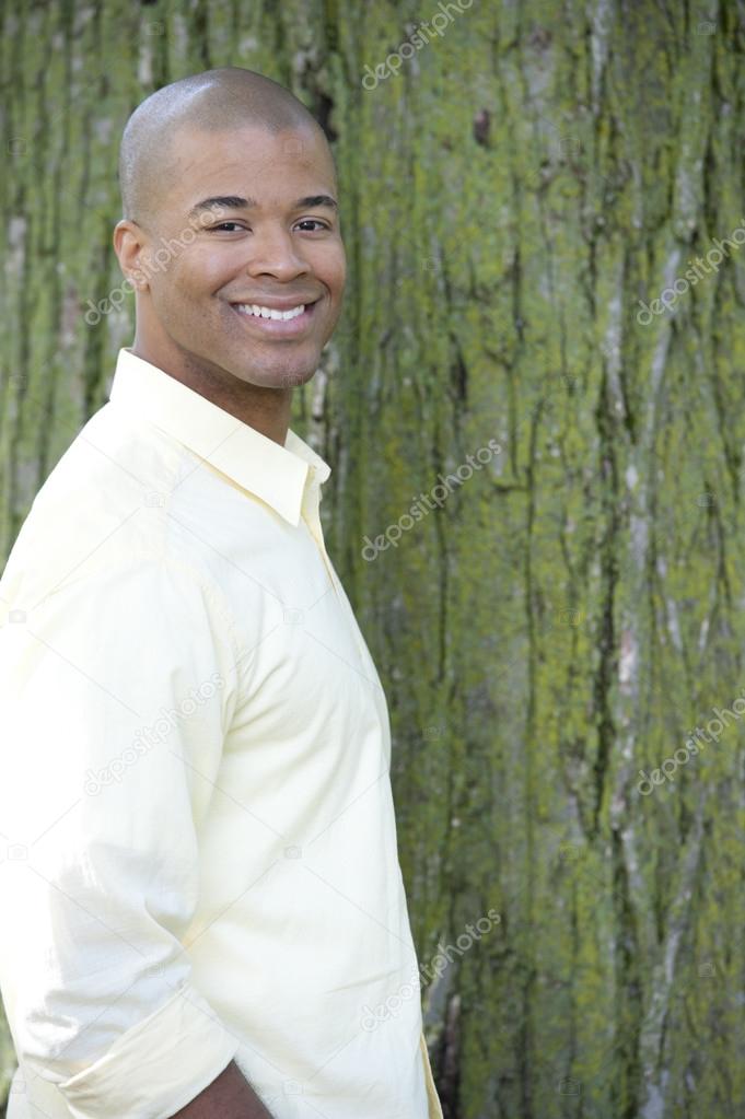 Young black man outdoors Stock Photo by ©eugenef 50555781