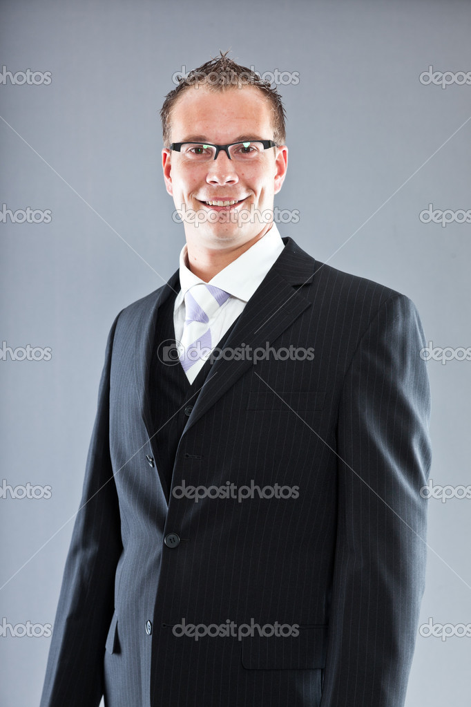 Happy young business man — Stock Photo © ysbrand #13748548