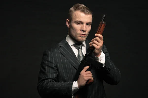 Mafia man with gun. Stock Photo by ©ysbrand 18593479
