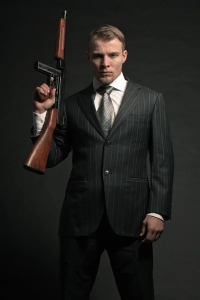 Mafia man with gun. Stock Photo by ©ysbrand 18593727