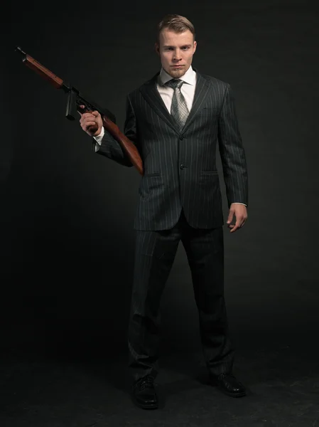 Mafia man with gun. Stock Photo by ©ysbrand 18593967