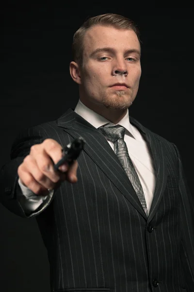 Mafia man with gun. Stock Photo by ©ysbrand 18593305