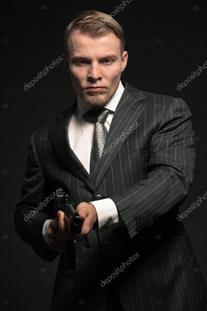 Mafia man with gun. — Stock Photo © ysbrand #18593209