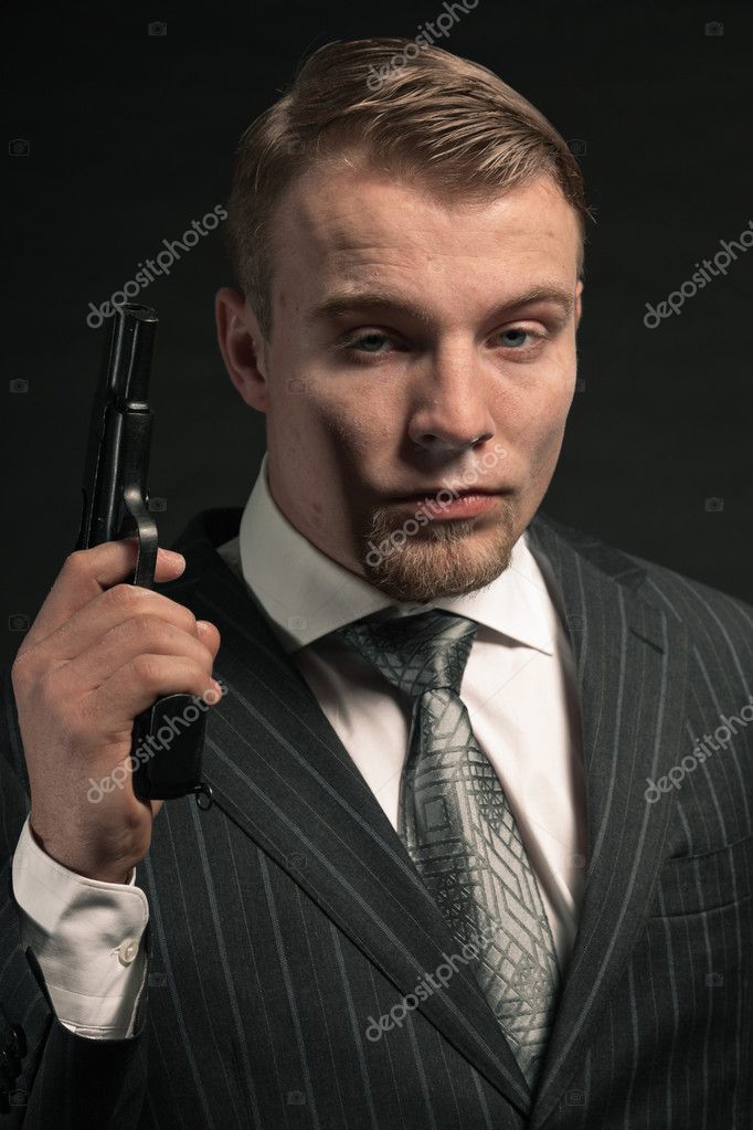 Mafia man with gun. — Stock Photo © ysbrand #18593899