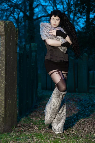 Gothic girl at cemetery. Stock Photo by ©ysbrand 18603875