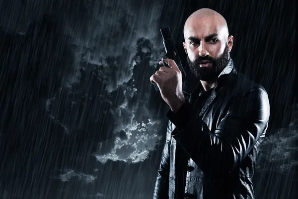 Bald man gun Stock Photos, Royalty Free Bald man gun Images | Depositphotos