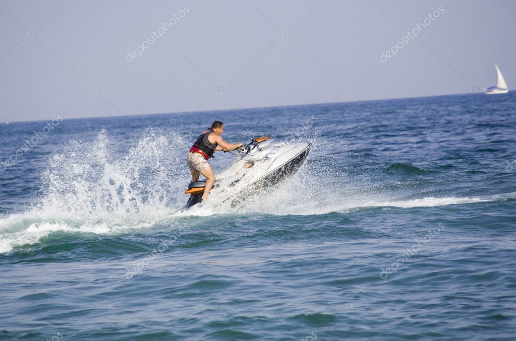 Water jet rider, jet skiing — Stock Editorial Photo © alexF-64 #48609015