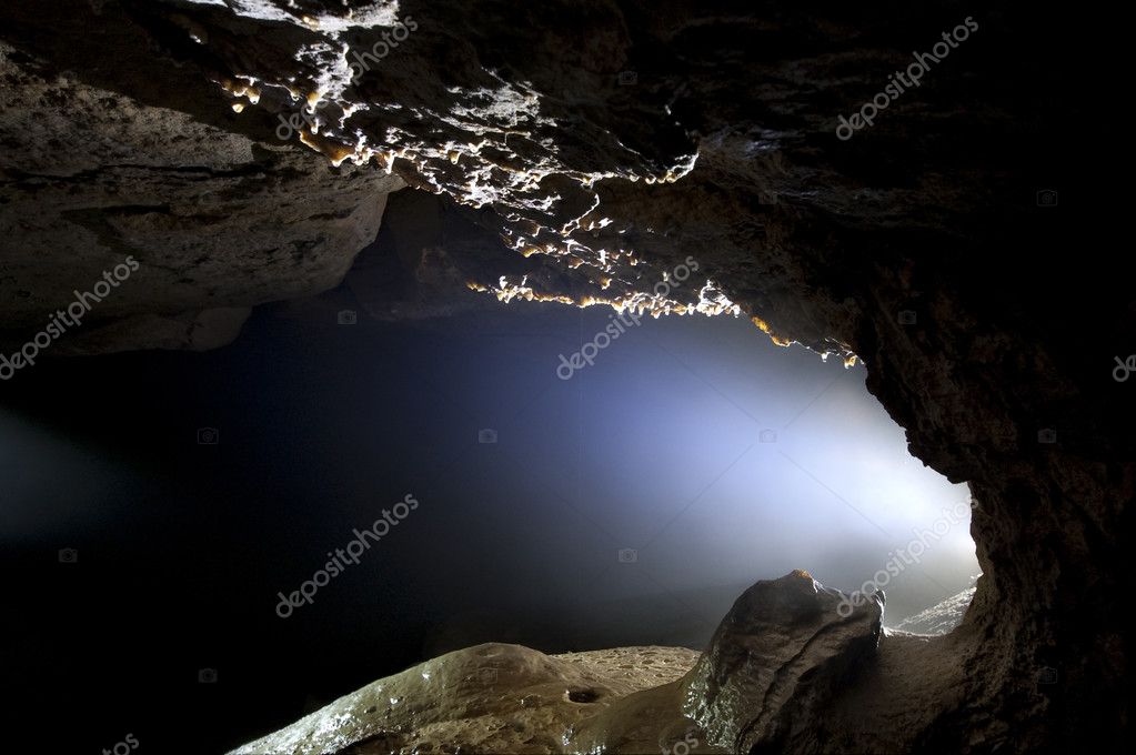 Light in a cave with limestone deposits — Stock Photo © photocosma ...