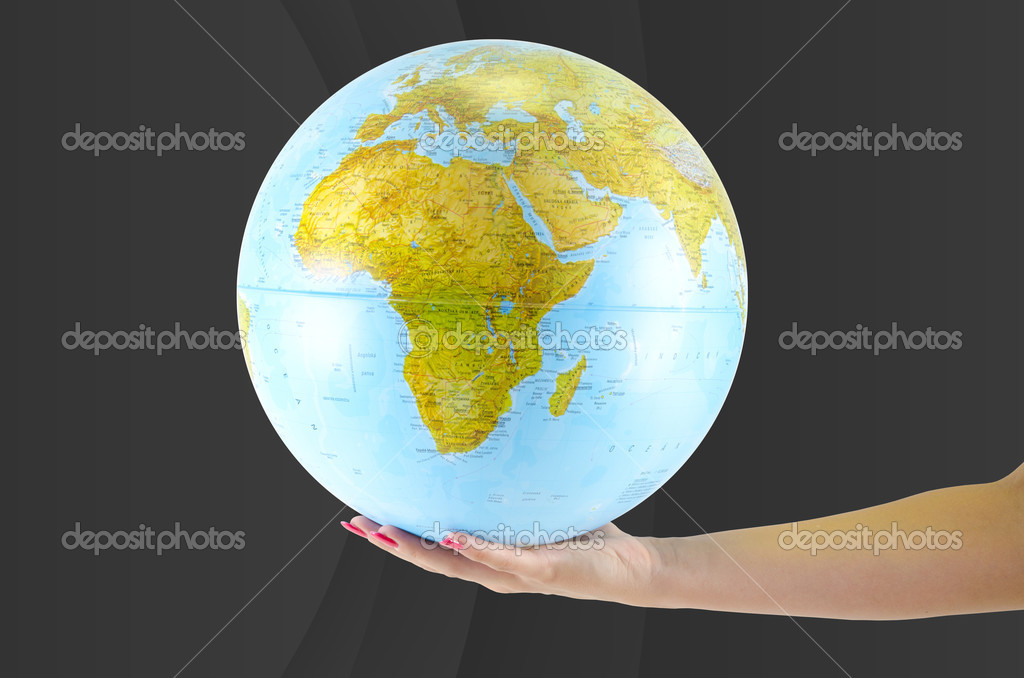 Earth globus in hand, various background Stock Photo by ©gudo 30095993