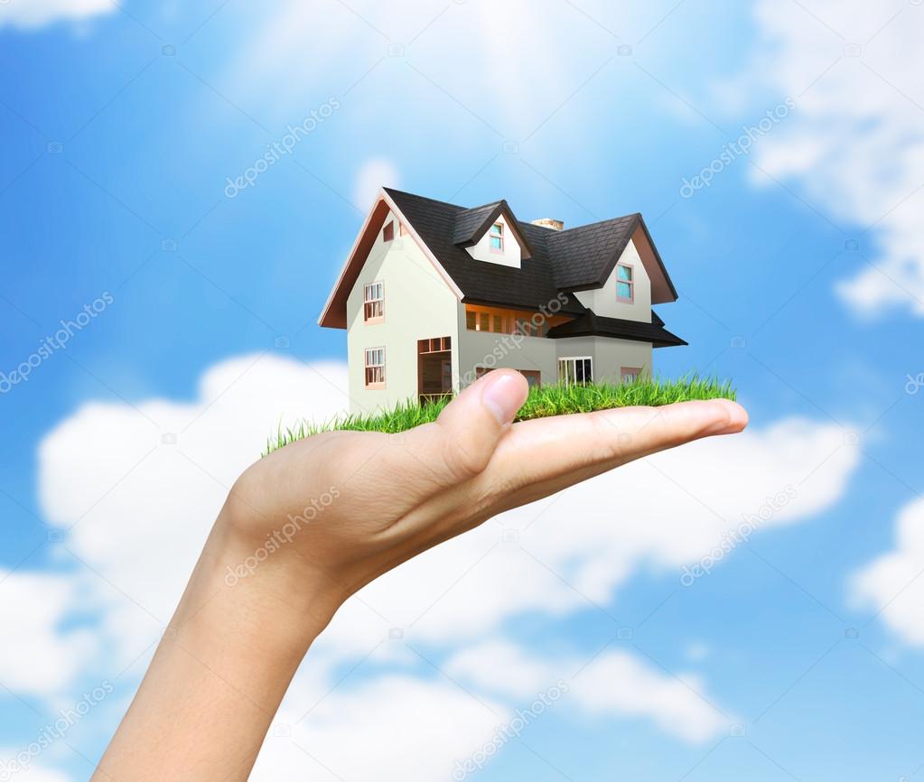 House model concept in hand Stock Photo by ©violetkaipa 44787903