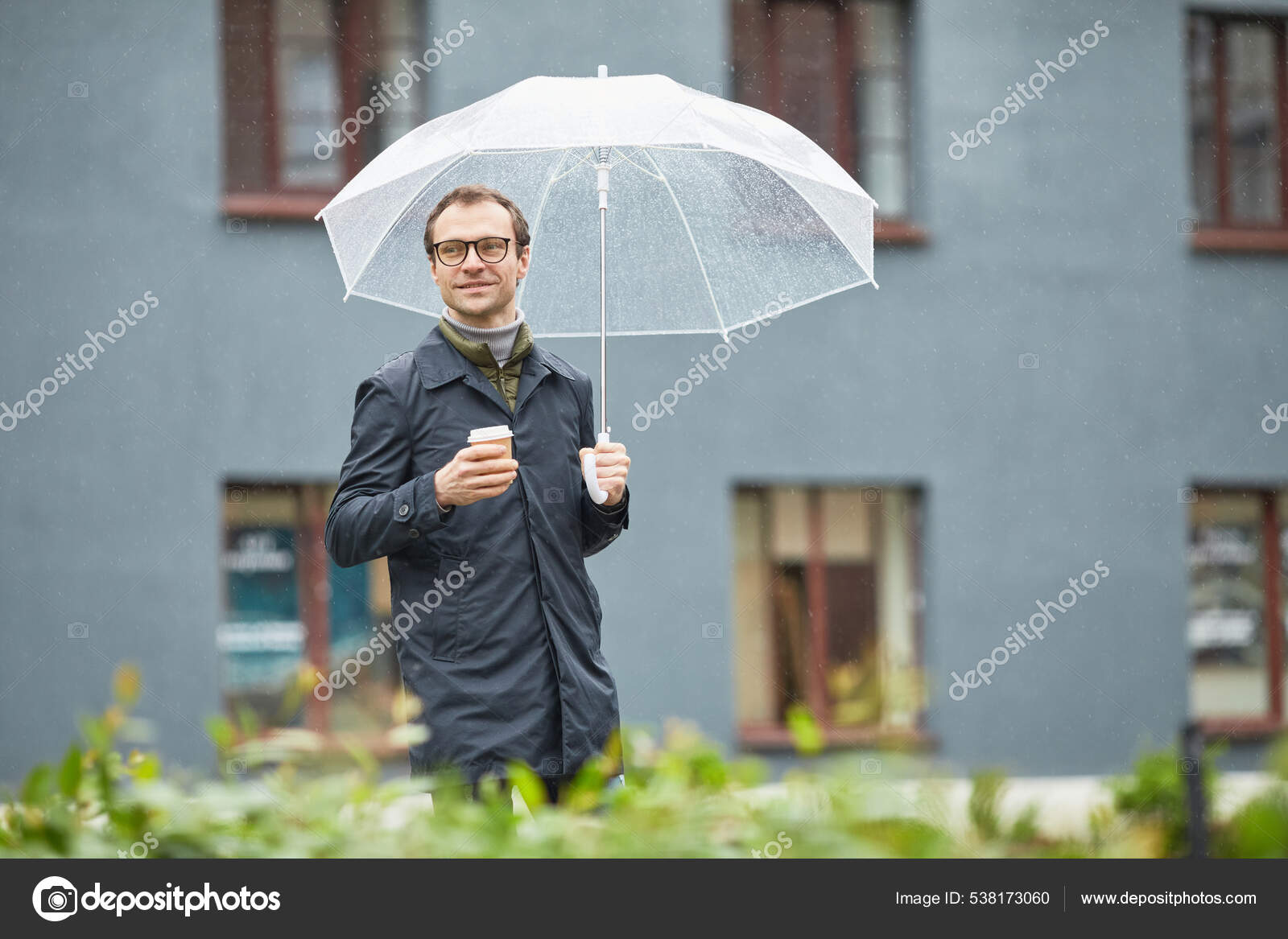 Man Walking Away In Rain