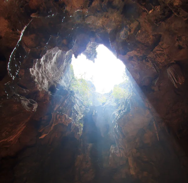 Sun rays in cave in thailand Stock Photo by ©Deerphoto 27828641