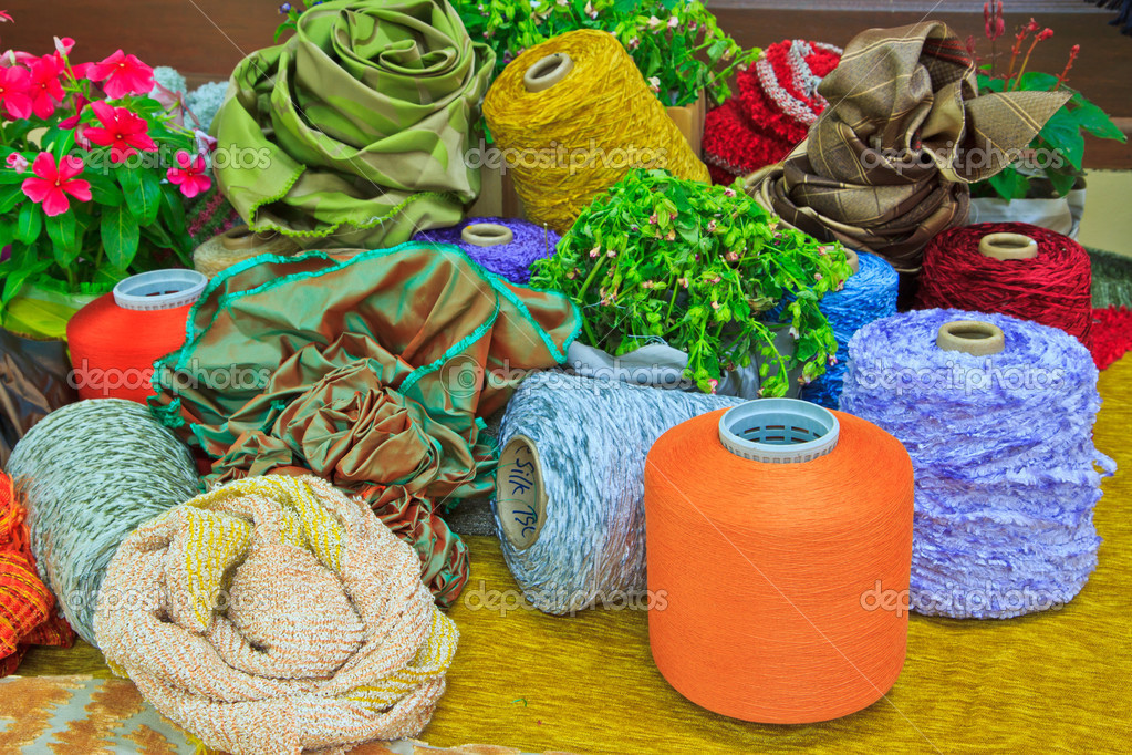 Embroidery colorful thread spool in rows Stock Photo by ©Deerphoto 36672805