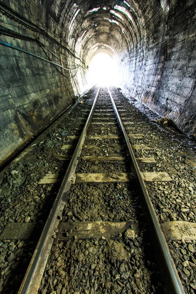 Light at the end of railroad tunnel - Stock Image - Everypixel