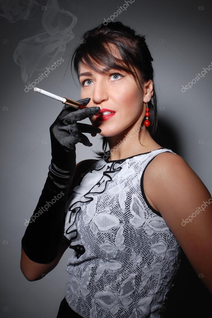 Stylish smoking lady — Stock Photo © itaesper #16926471