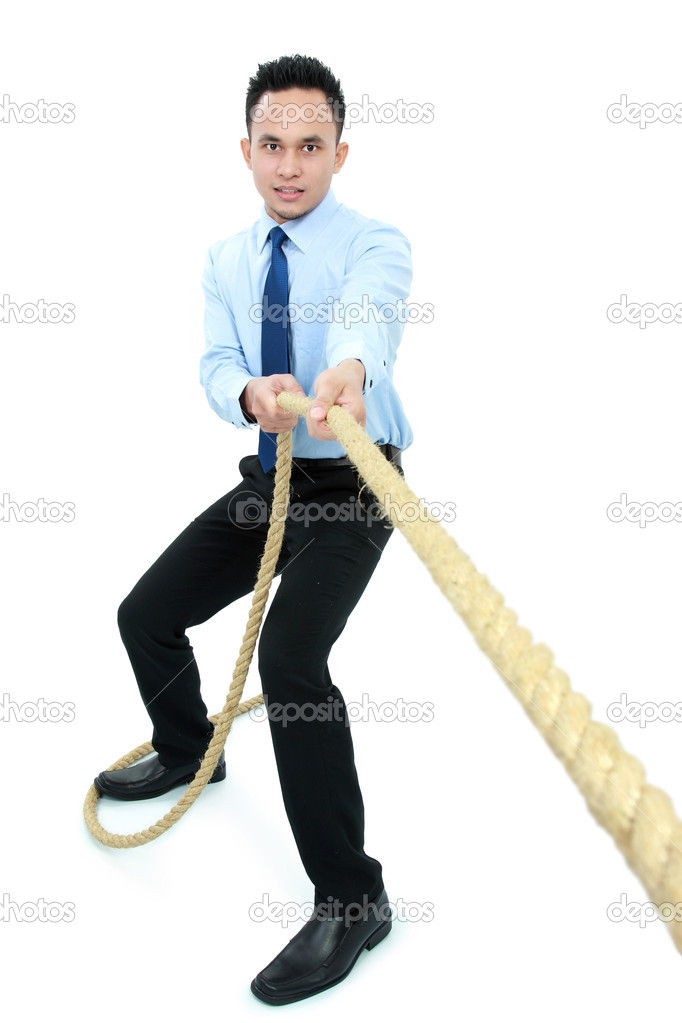 Man pulling a rope Stock Photo by ©odua 16978509