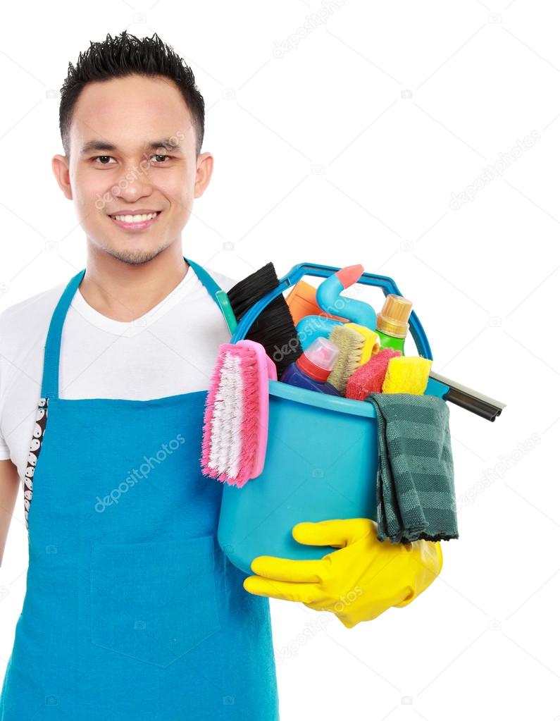 Male with cleaning equipment Stock Photo by ©odua 19848031