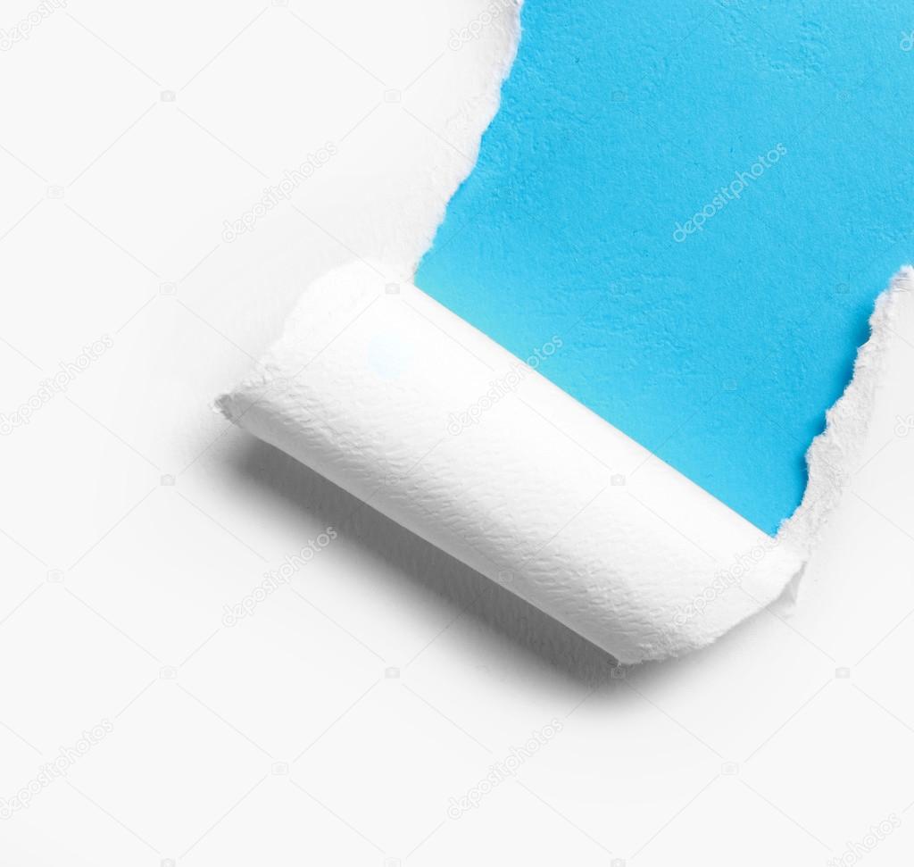 Corner white torn paper with blue background Stock Photo by ©odua 26485123