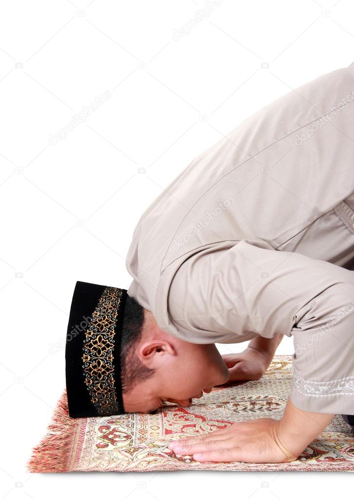 Man muslim doing prayer Stock Photo by ©odua 41087423