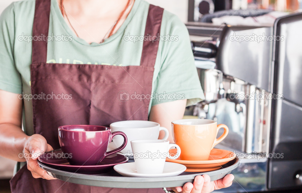 Barista preparing set of freshly brewed coffee for serving — Stock ...