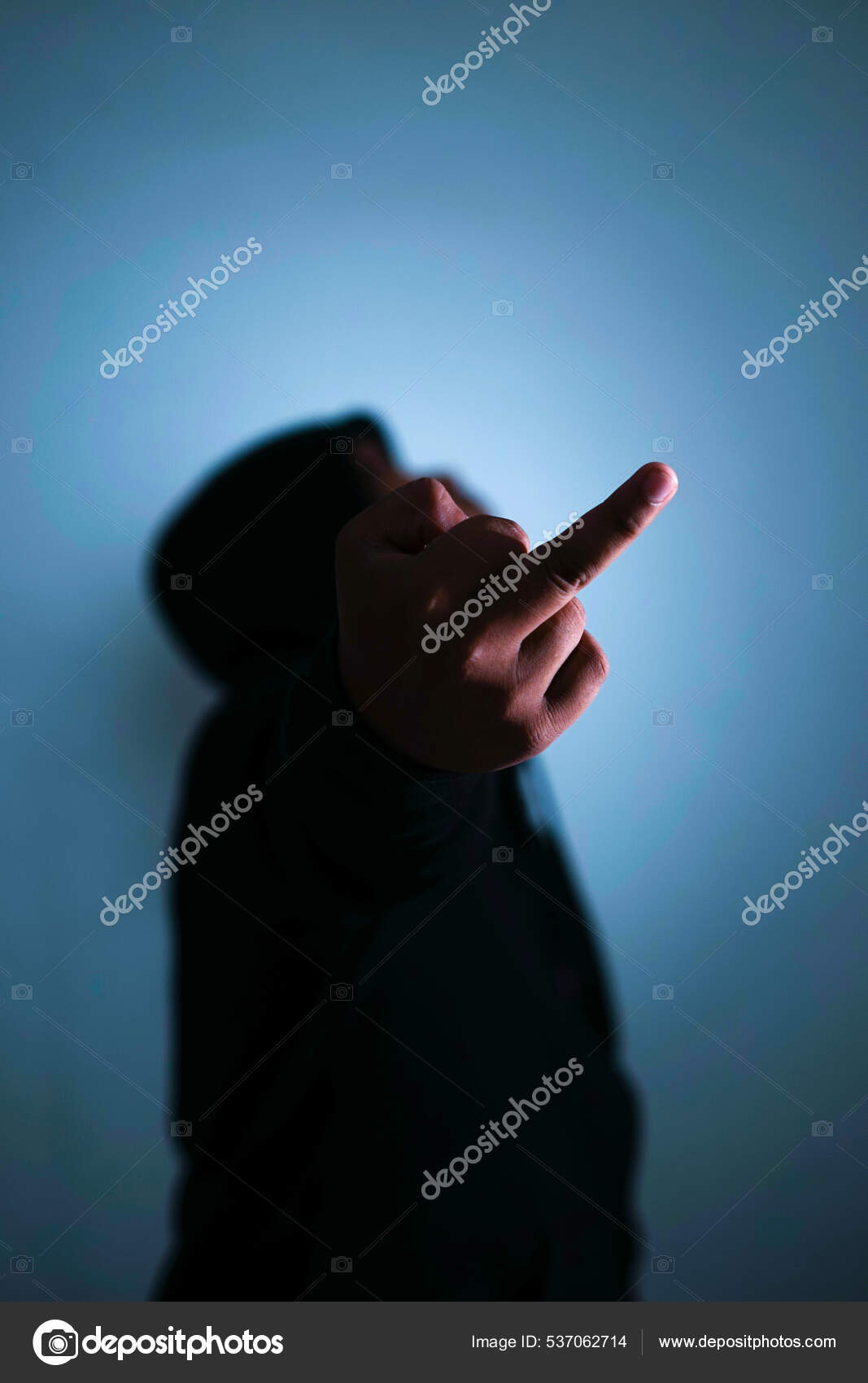 Unidentified Man Wearing Black Hoodie Puts His Middle Finger Portrait ...