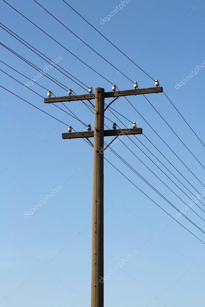 Old concrete electricity pylon — Stock Photo © LEXXIZM #43114995