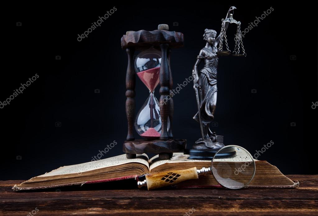 Old book temida statue and magnifying glass Stock Photo by ©yeti88 14321923