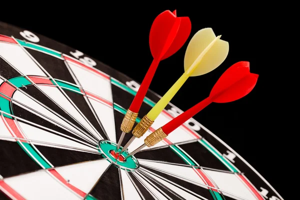 Colorful darts hitting a target — Stock Photo © krasyuk #7338362