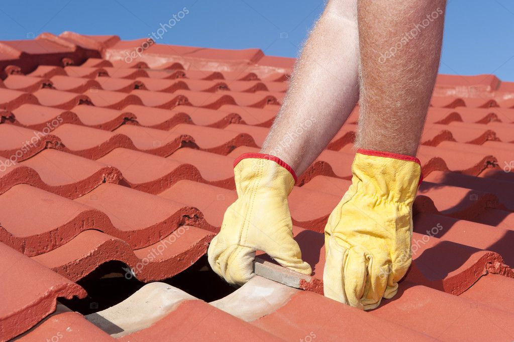 Construction worker tile roofing repair Stock Photo by ©roboriginal ...