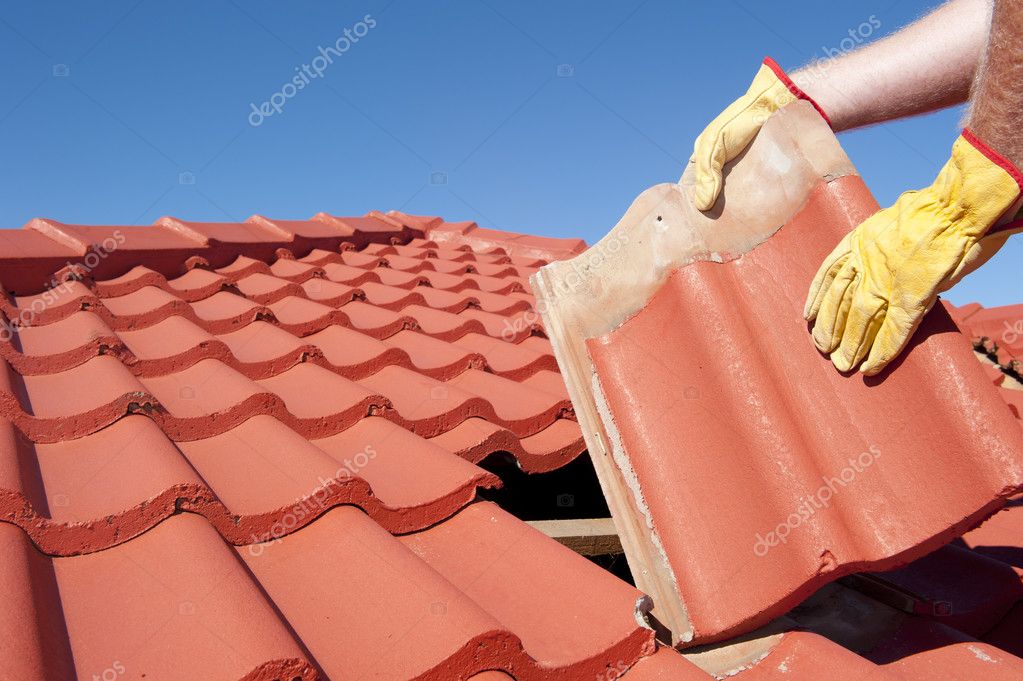 Construction worker tile roofing repair Stock Photo by ©roboriginal ...