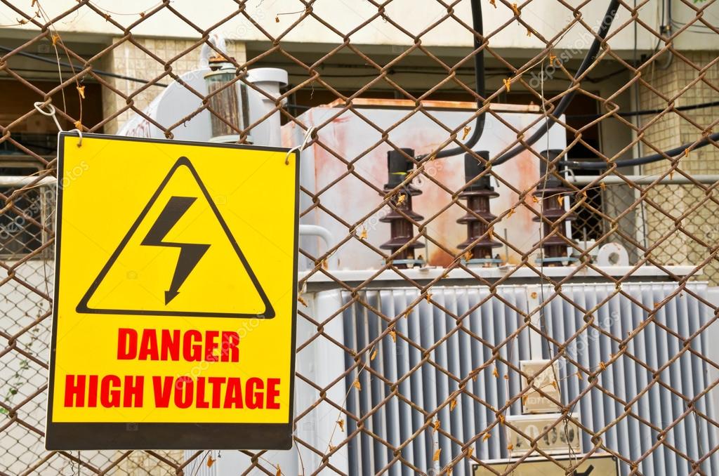 Danger high voltage warning sign Stock Photo by ©tomgigabite 49920457
