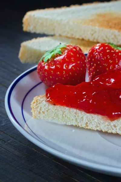 Toast with strawberry jelly Stock Photo by ©anskuw 16927065
