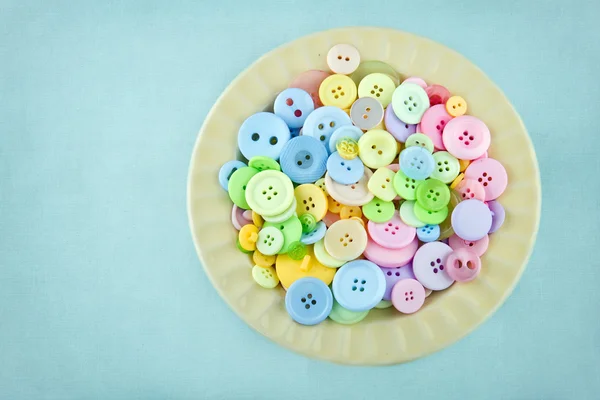 Pastel color buttons on a blue background — Stock Photo © anskuw #23238298