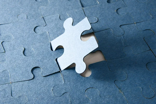 Last piece of jigsaw puzzle - Stock Image - Everypixel
