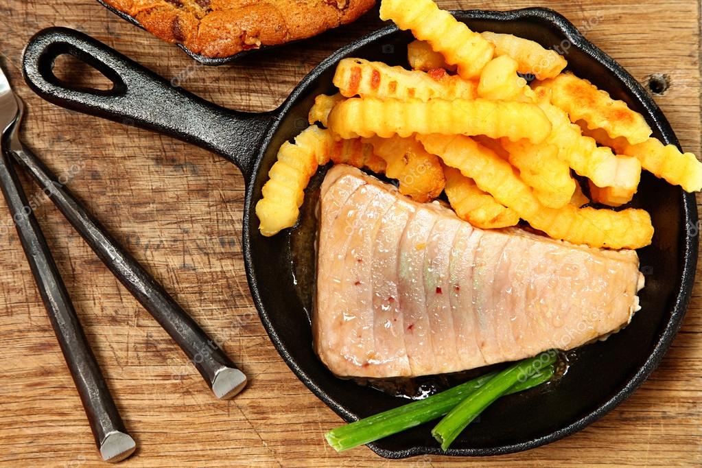 Sashimi Tuna and Chips in Skillet on Table Stock Photo by ©duplass 43566629