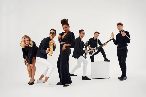 Young international musicians, a band performing. The concept of music ...