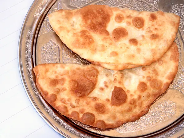 Turkish cheese pie fried in oil ( Cig borek ). - Stock Image - Everypixel