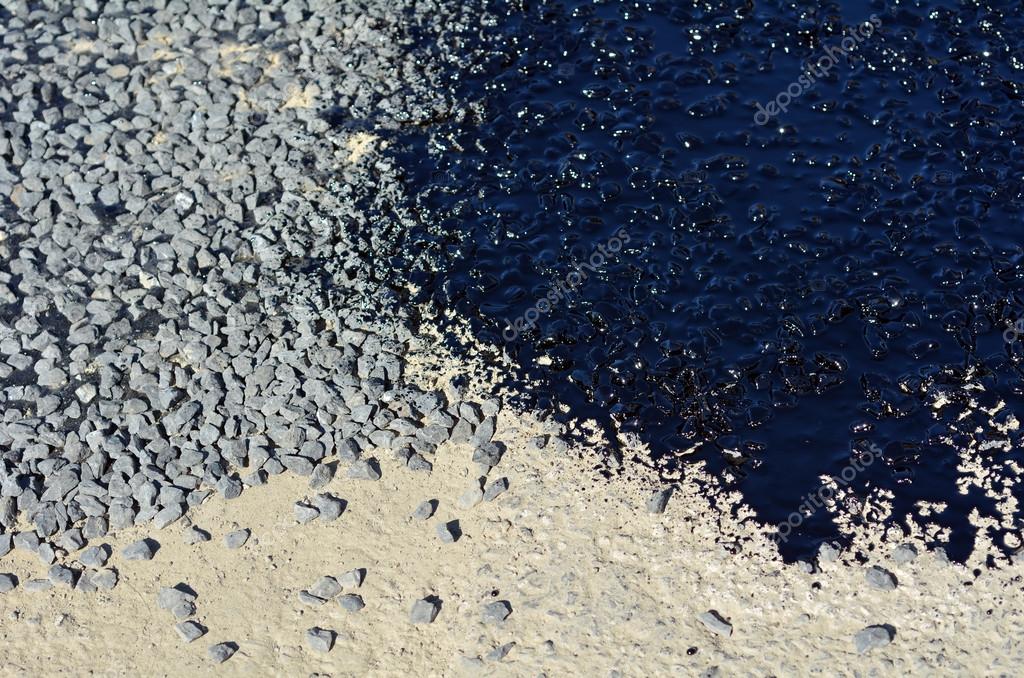 Old concrete road surface with fresh tar and new asphalt road Stock ...