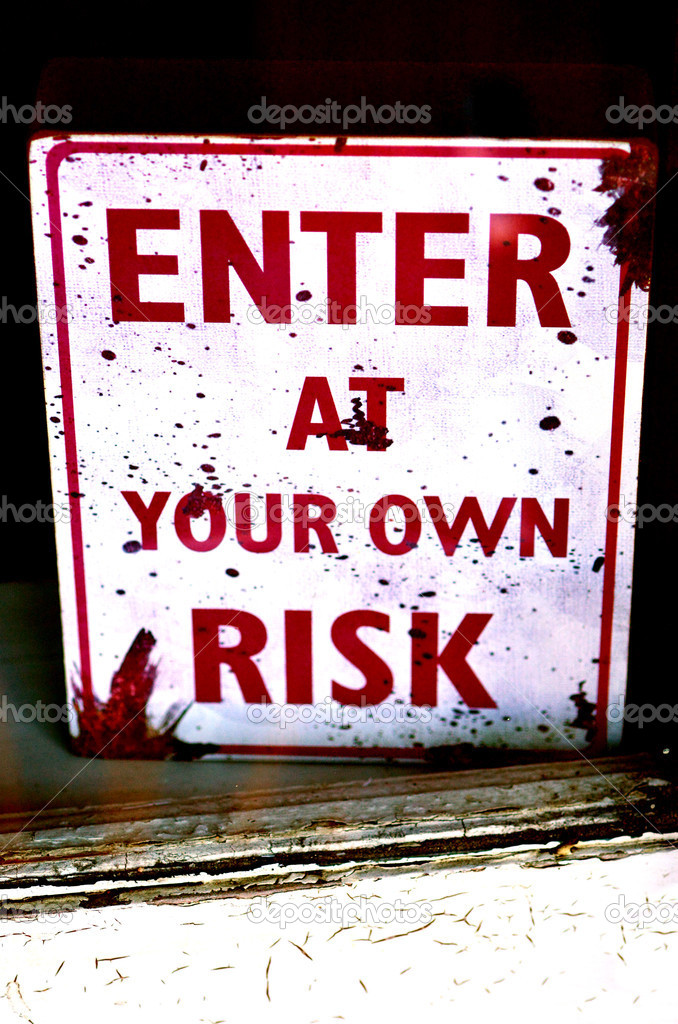 Enter at your own risk sign Stock Photo by ©lucidwaters 44172231