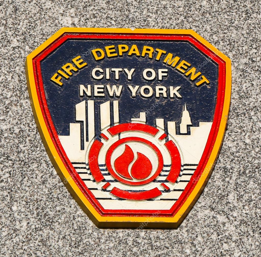 FDNY emblem on fallen officers memorial in Brooklyn, NY. — Stock ...