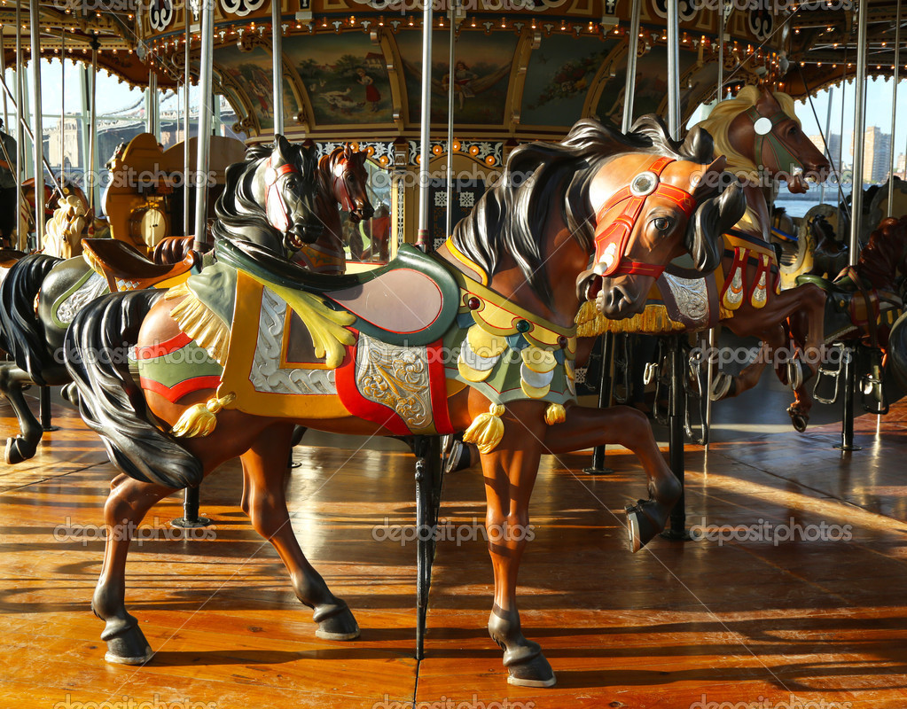Horses on a traditional fairground carousel – Stock Editorial Photo ...