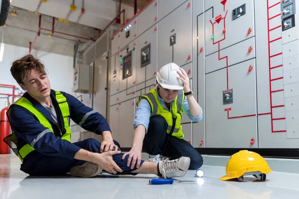 First aid support accident at work of worker at factory. Male worker ...