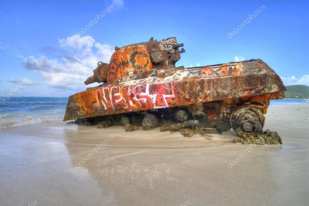 Old tank at Flamenco Beach Stock Photo by ©czuber 20401199