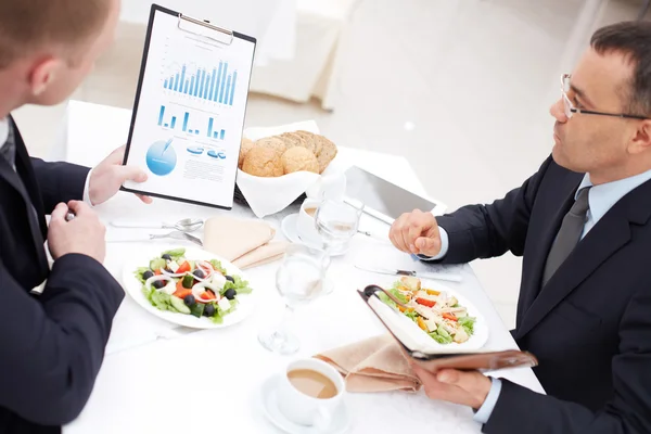 At business lunch Stock Photo by ©pressmaster 29872969