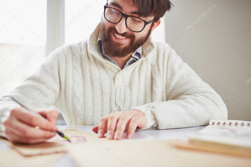 Man drawing — Stock Photo © pressmaster #42523211