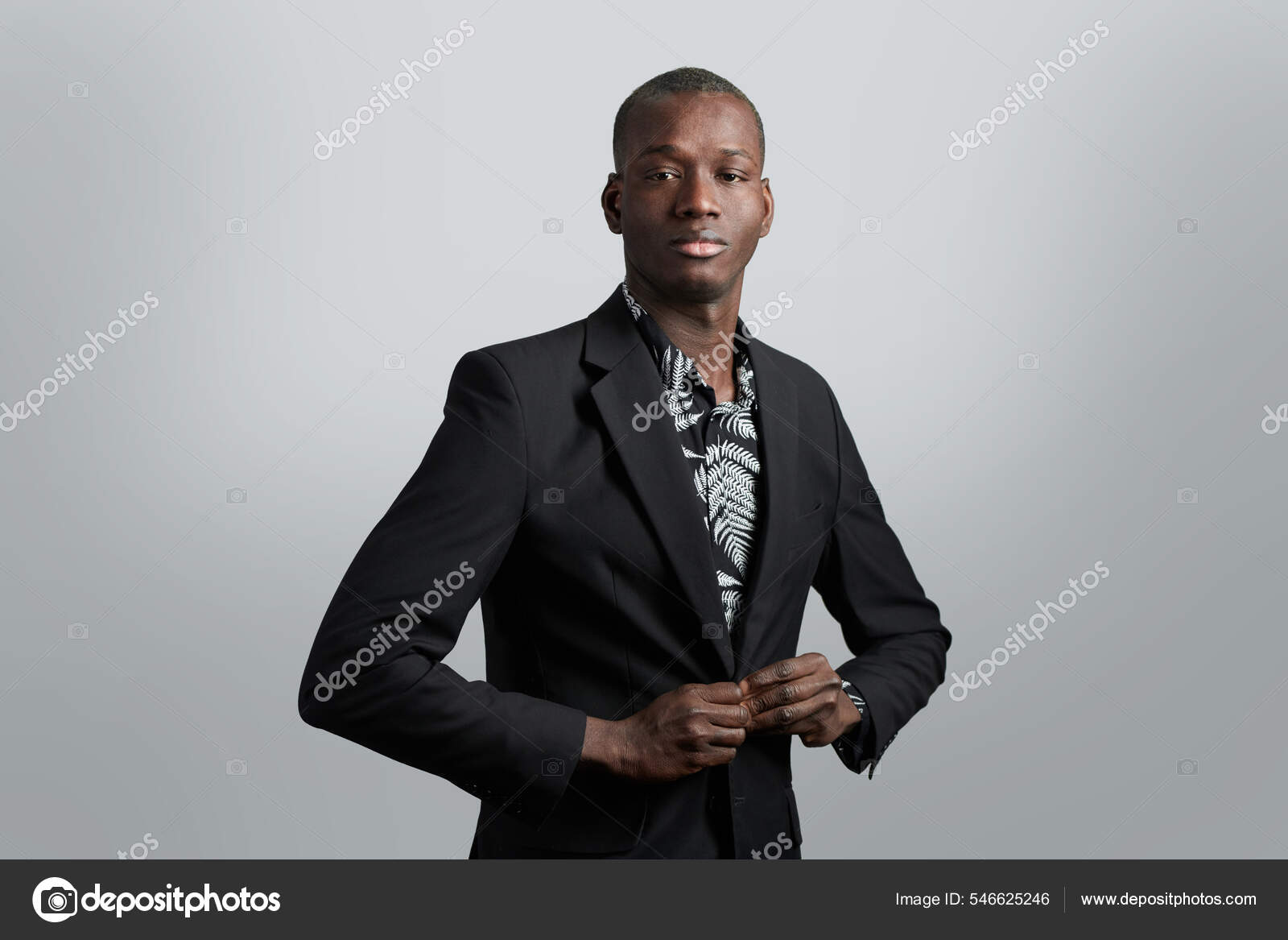 African serious man in black suit Stock Photo by ©pressmaster 546625246