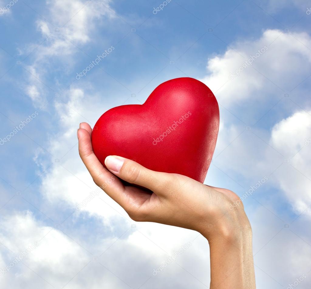 Heart in hand Stock Photo by ©zaretskaya 38405763