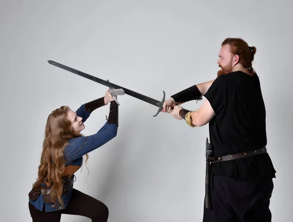 Woman man swords Stock Photos, Royalty Free Woman man swords Images ...