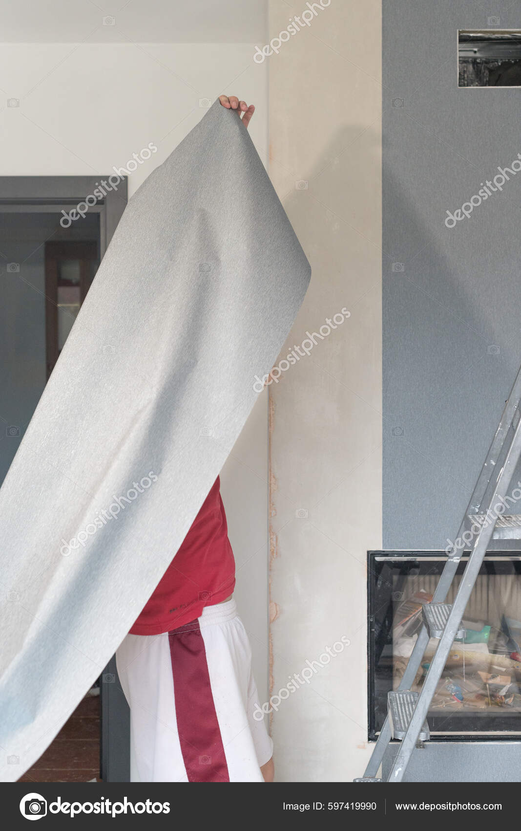 Man Glues Wallpaper Wall House Craftsman Uses Ladder Glue Wallpaper ...