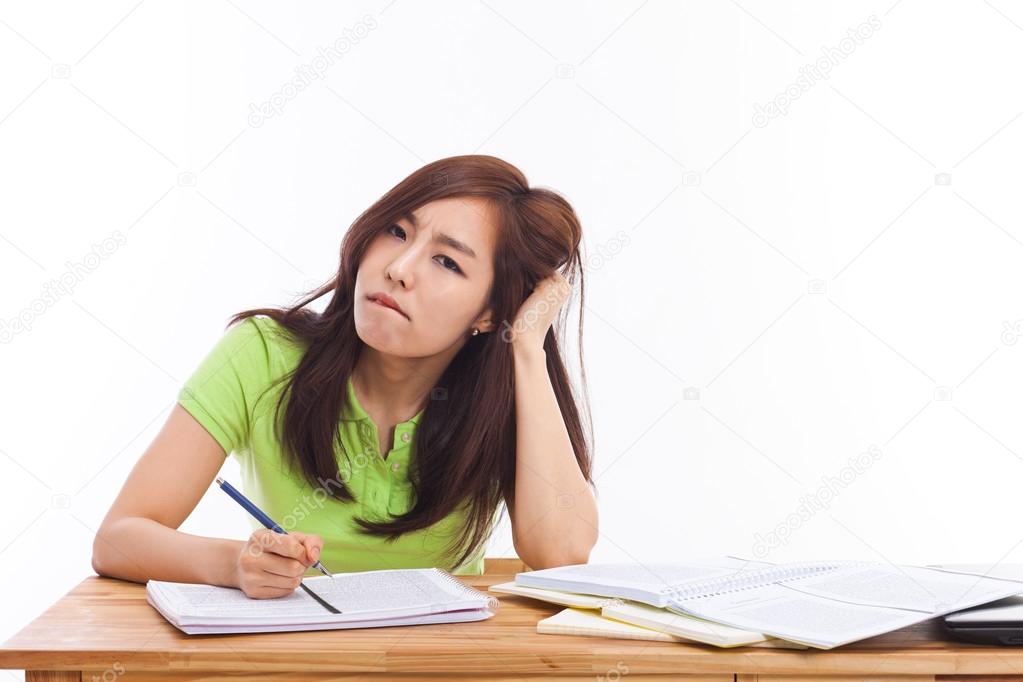 Young Asian student having trouble on desk. Stock Photo by ©hans3513 ...